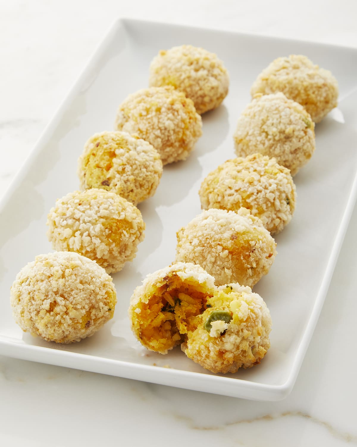 The Cajun Turkey Co 20-Piece Breaded Paella Arancini Bites | Neiman Marcus