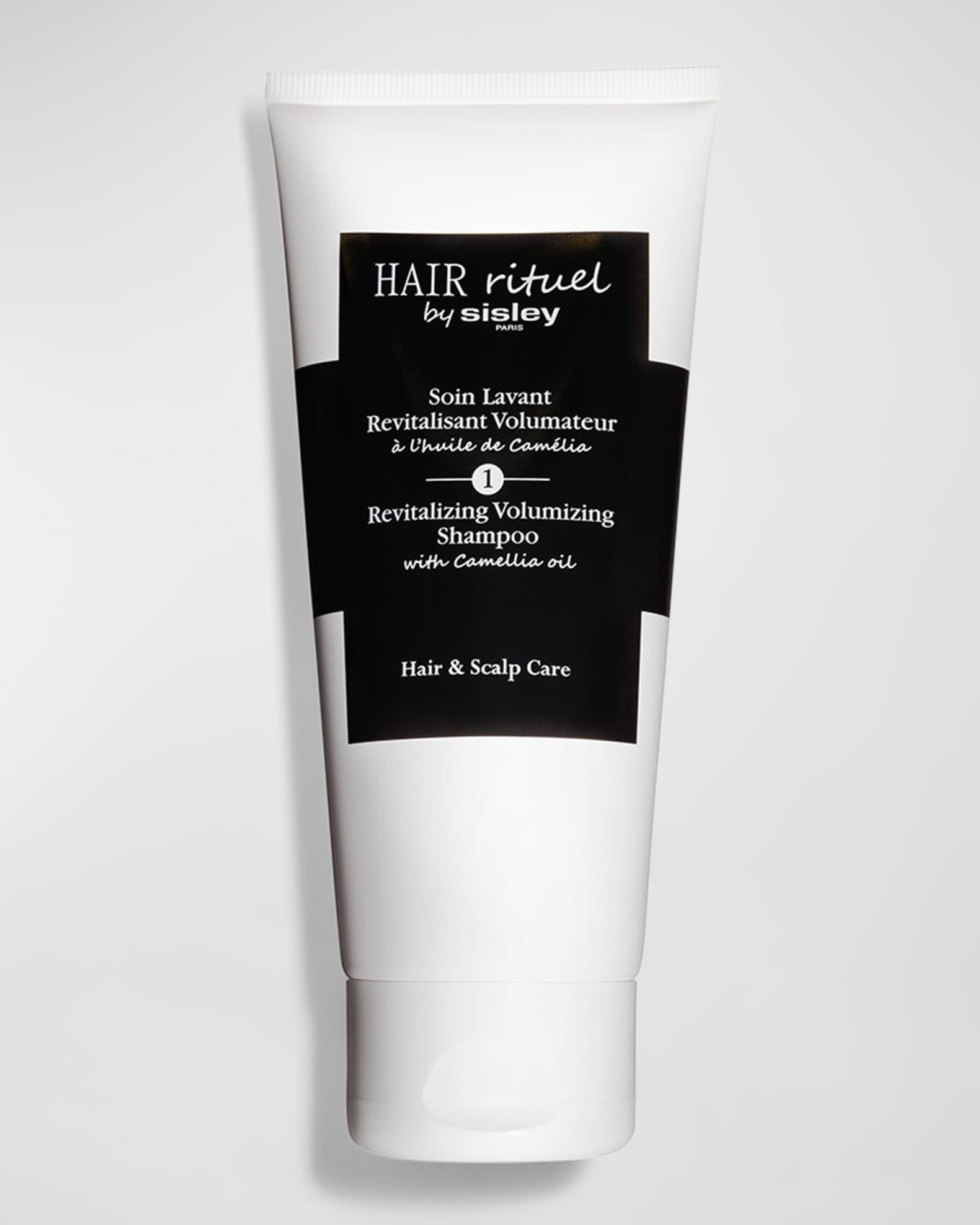 Sisley Paris 6.7 oz. Revitalizing Volumizing Shampoo with Camellia Oil | Neiman Marcus