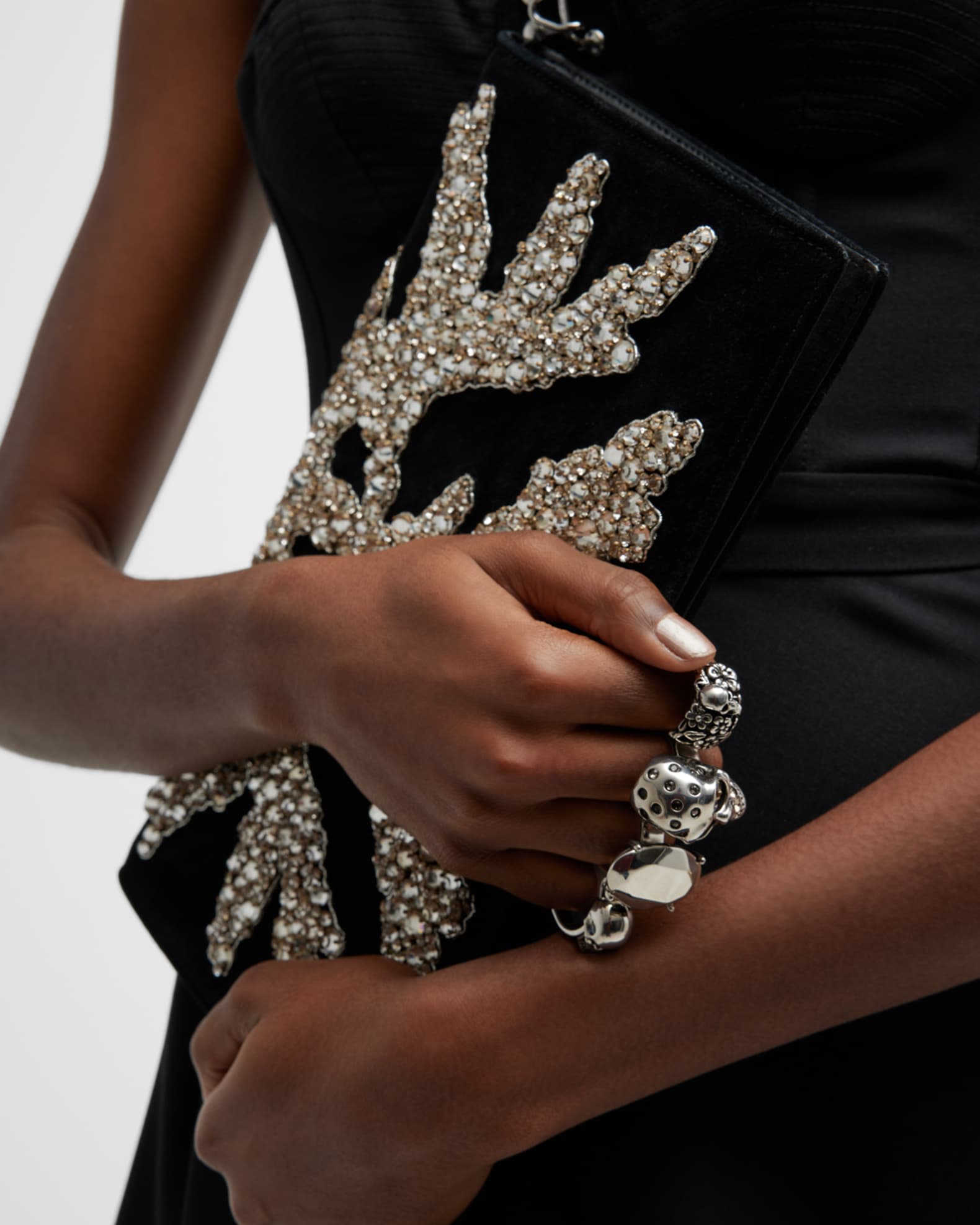 Alexander McQueen Skull Four Ring Spine Flat Clutch Bag | Neiman Marcus