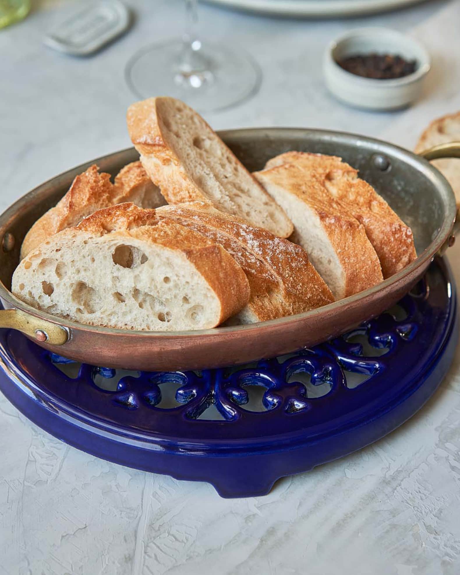 Staub Cast Iron 9" Round Lilly Trivet | Neiman Marcus