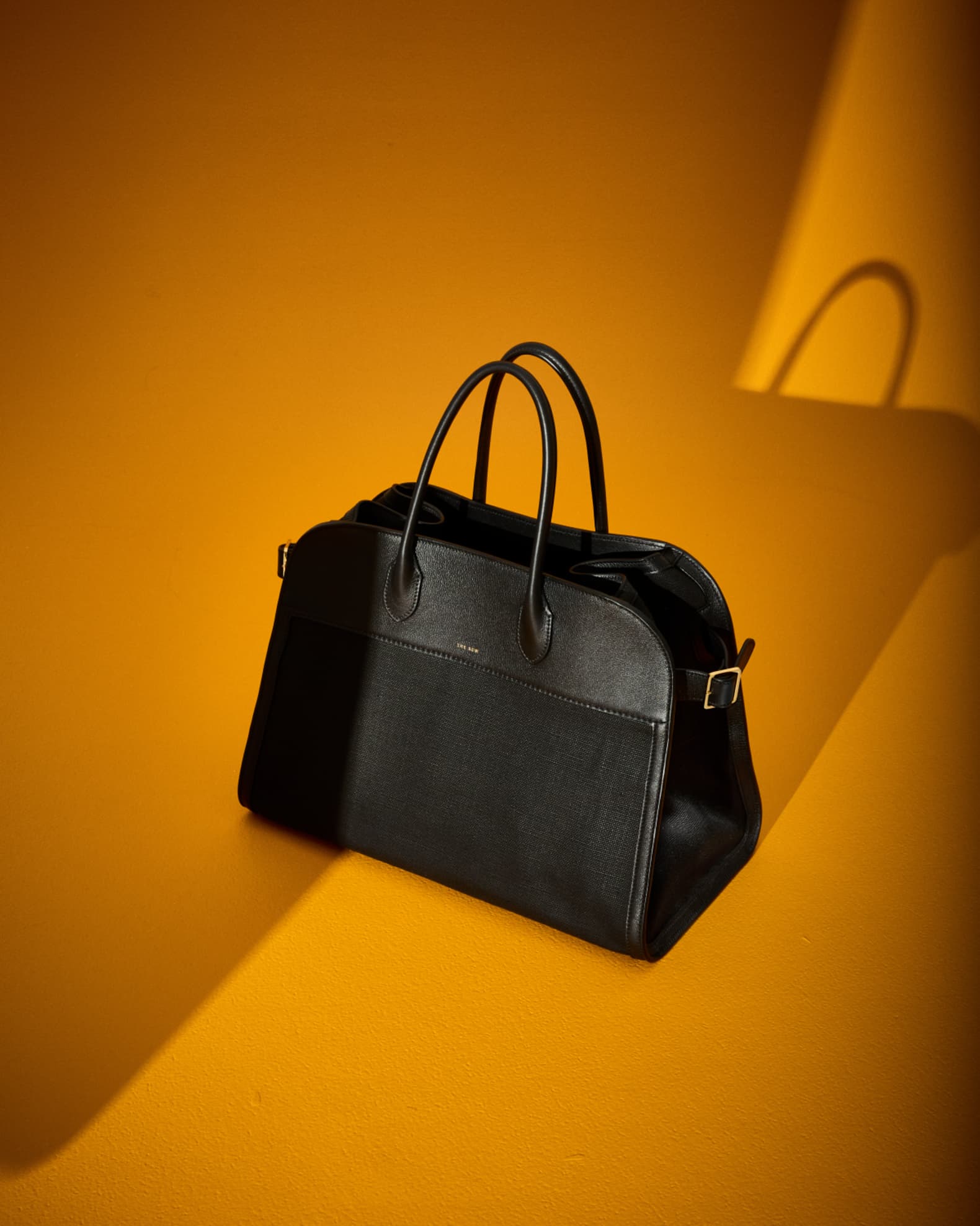 THE ROW Margaux 15 Top-Handle Bag in Canvas and Leather | Neiman Marcus