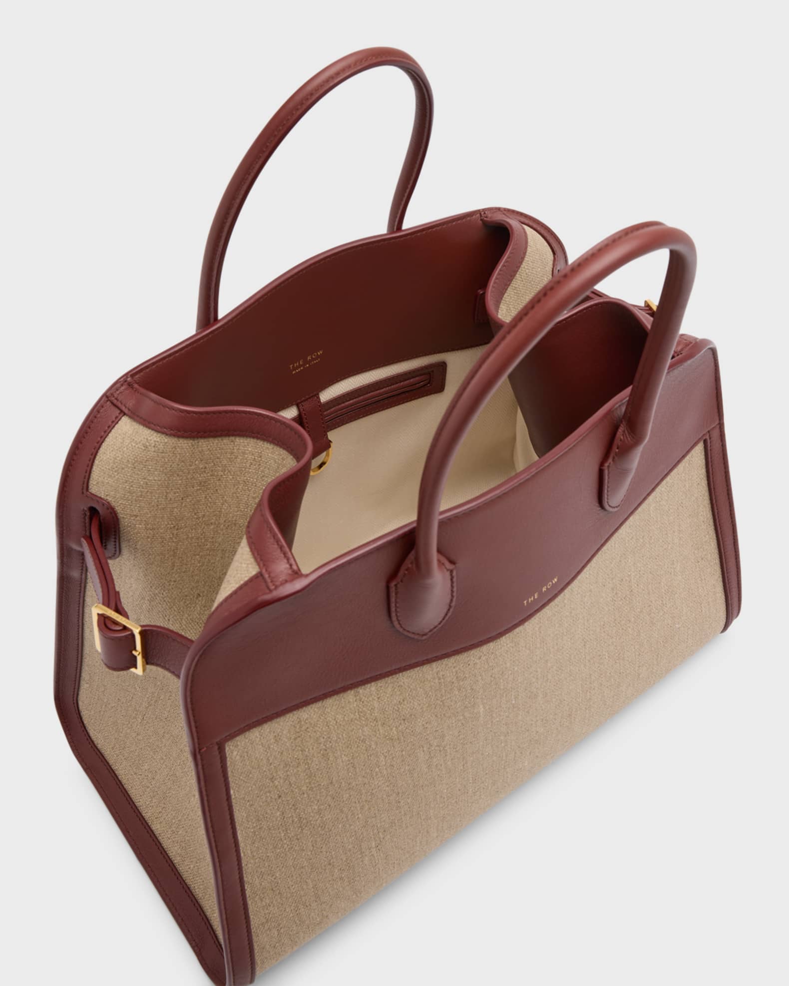 THE ROW Margaux 15 Top-Handle Bag in Canvas and Leather | Neiman Marcus