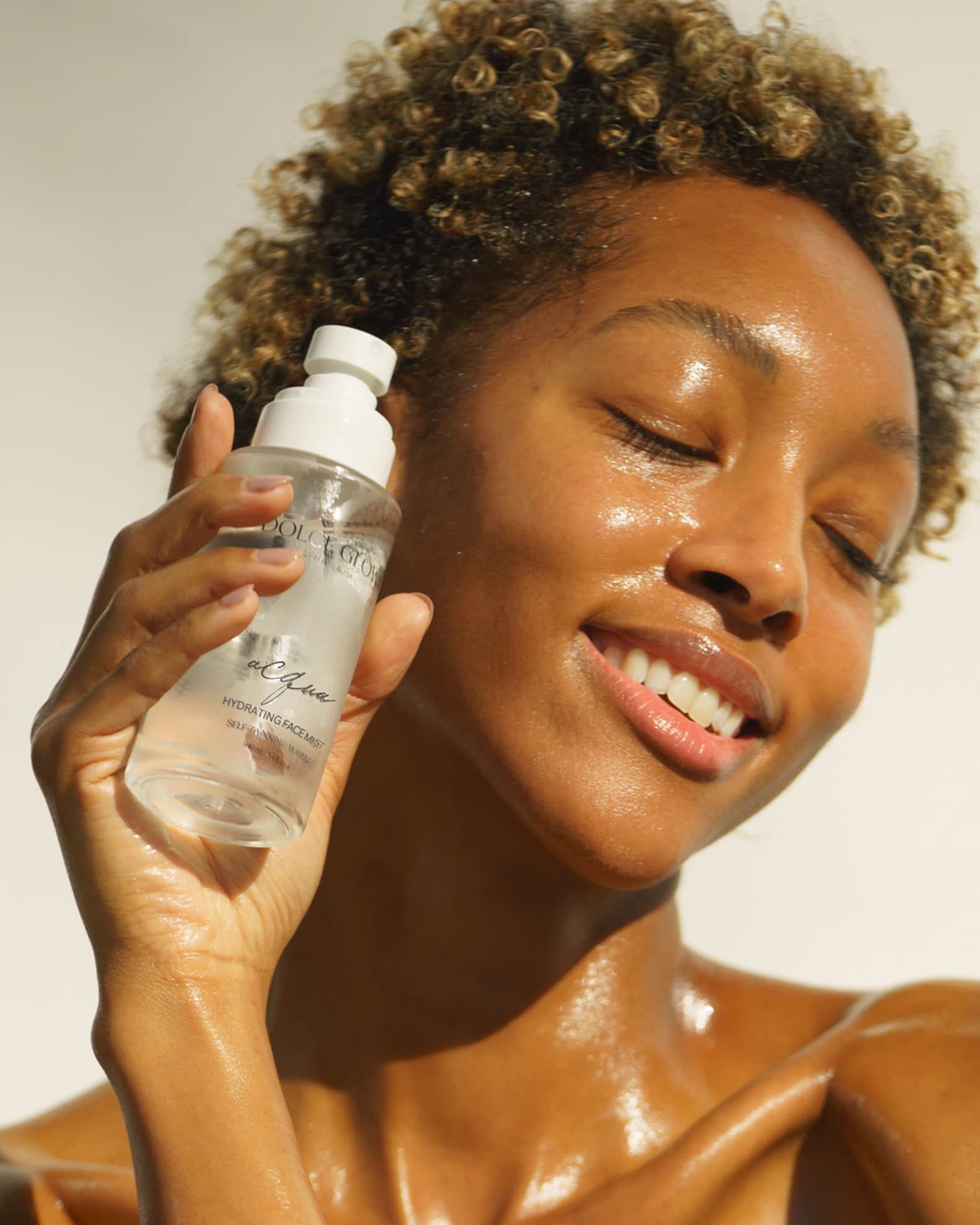 Dolce Glow Acqua Hydrating Self-Tanning Water Face Mist | Neiman Marcus