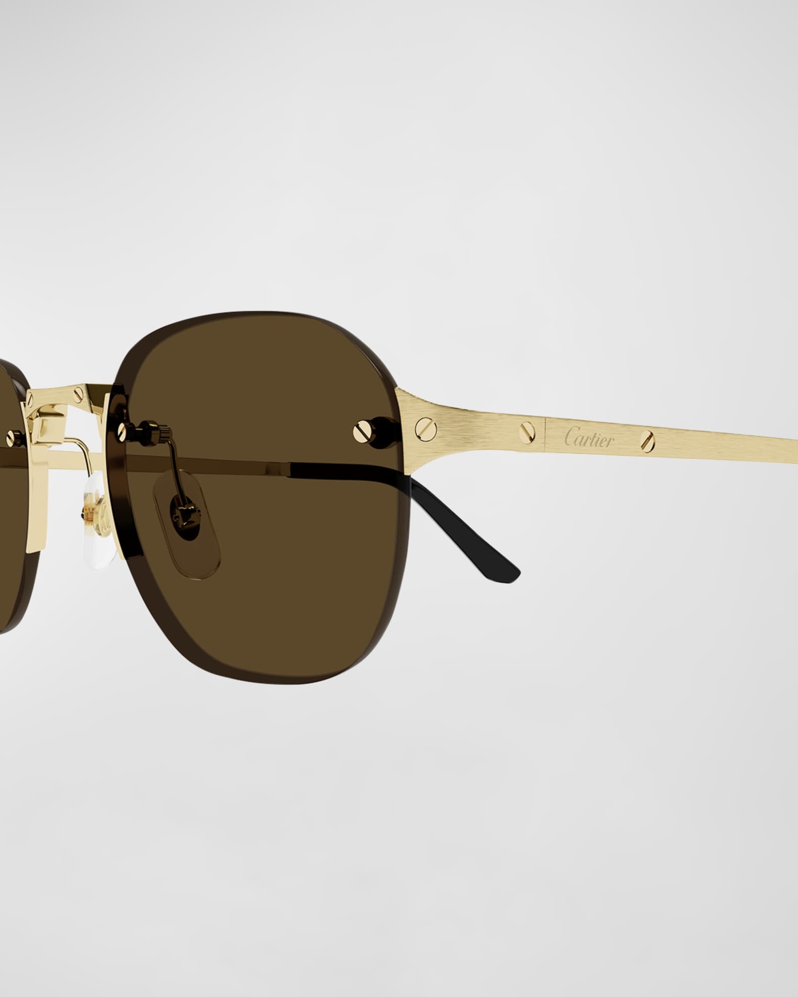 Cartier Men's CT0459SM Rimless Metal Round Sunglasses | Neiman Marcus