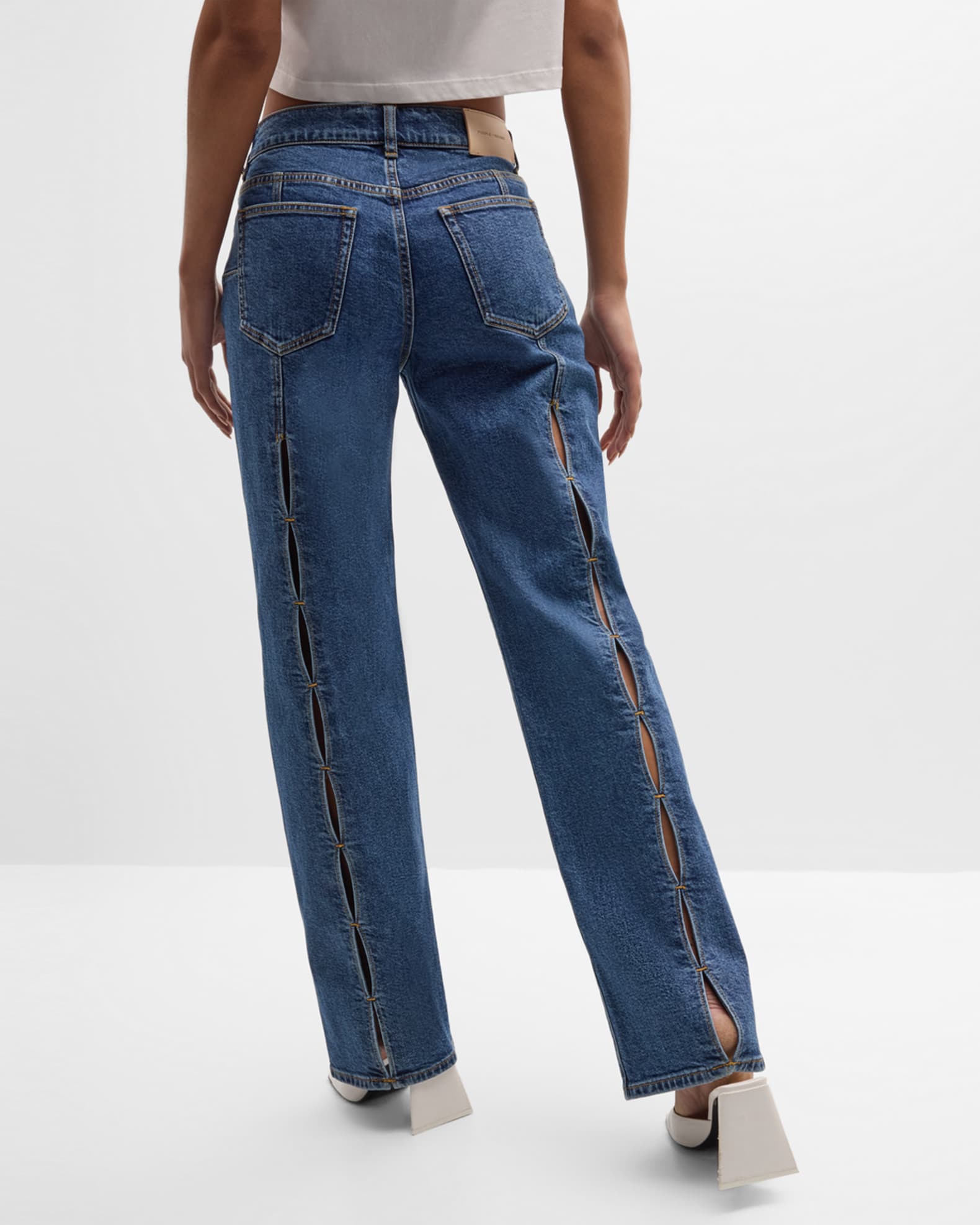 PURPLE Slim Straight Cut-Out Jeans | Neiman Marcus