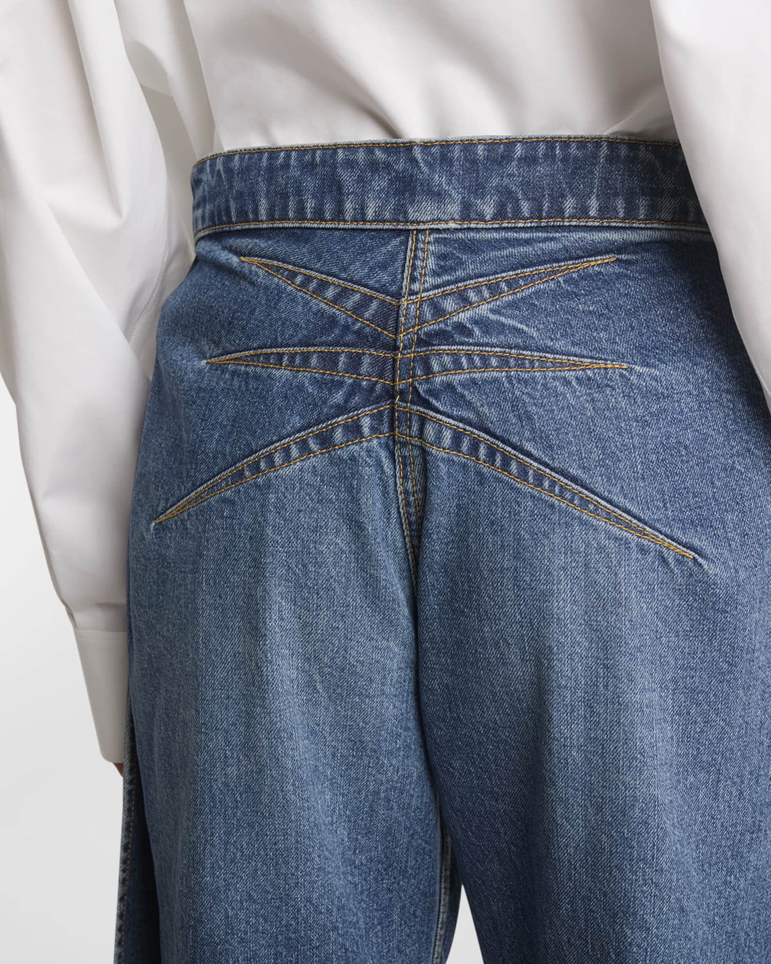 ALAIA Slit Rounded Petal Denim Pants | Neiman Marcus