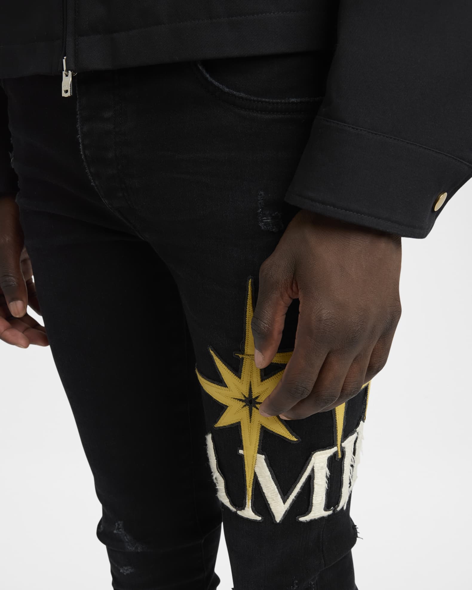 Amiri Men's Starburst Applique Skinny Jeans | Neiman Marcus