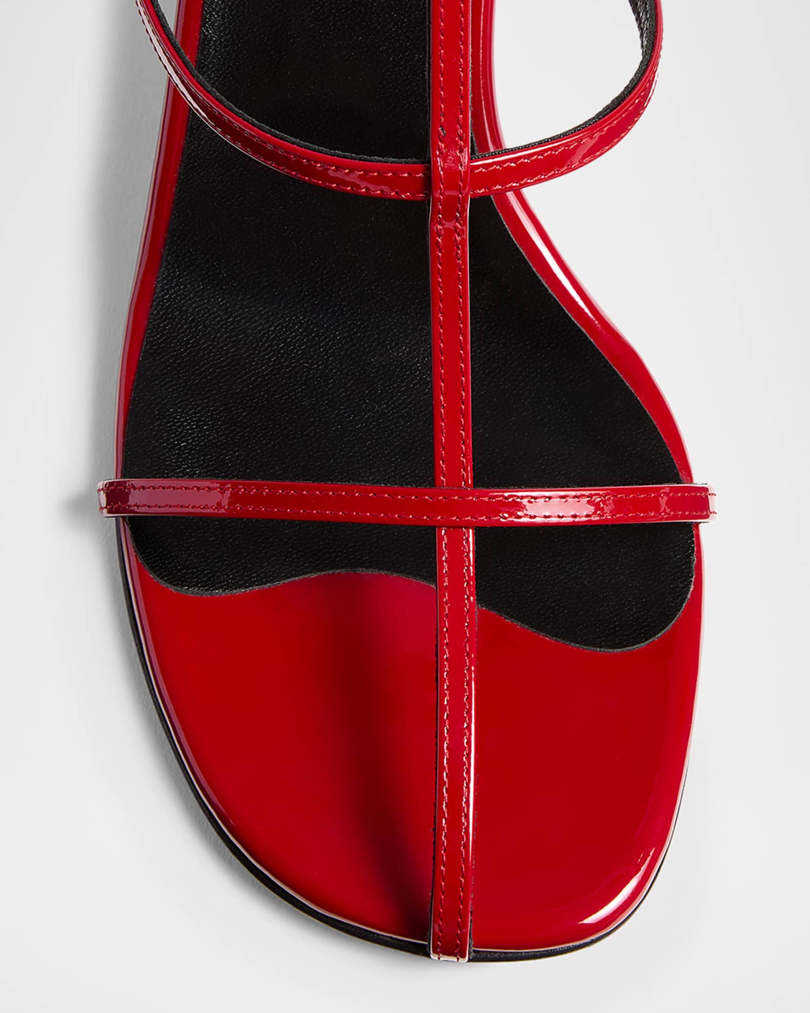 Khaite Leather T-Strap Sandals | Neiman Marcus