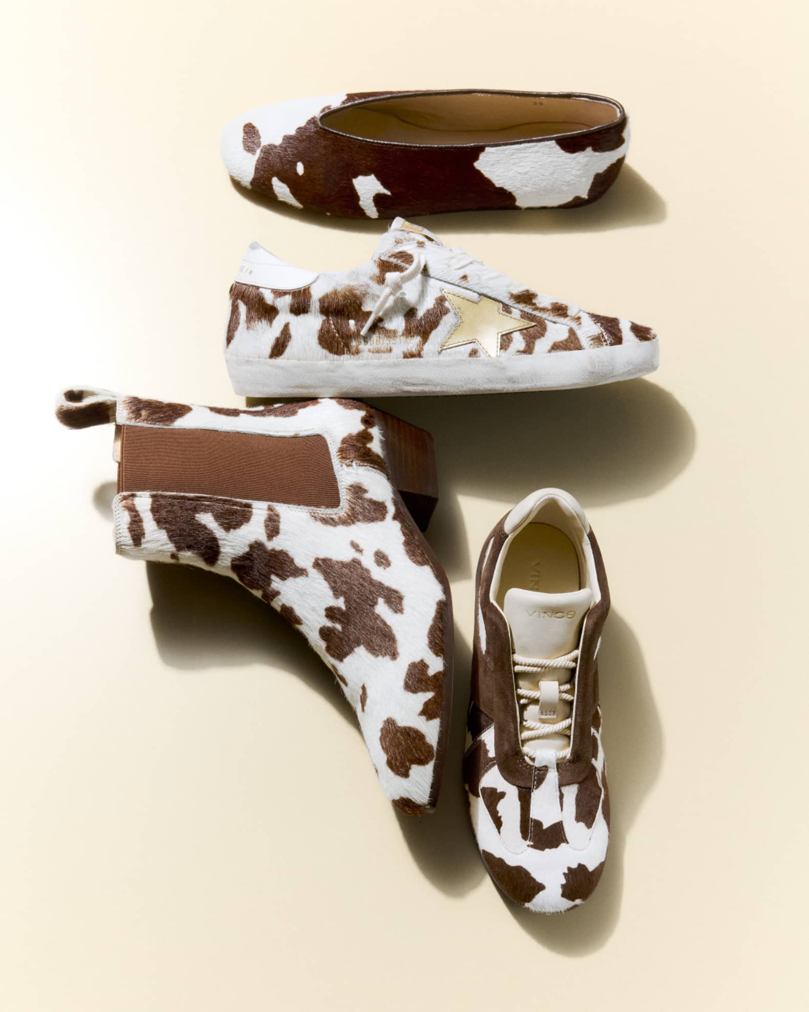 Odissi Ella Cow-Print Pony Hair Chelsea Booties | Neiman Marcus